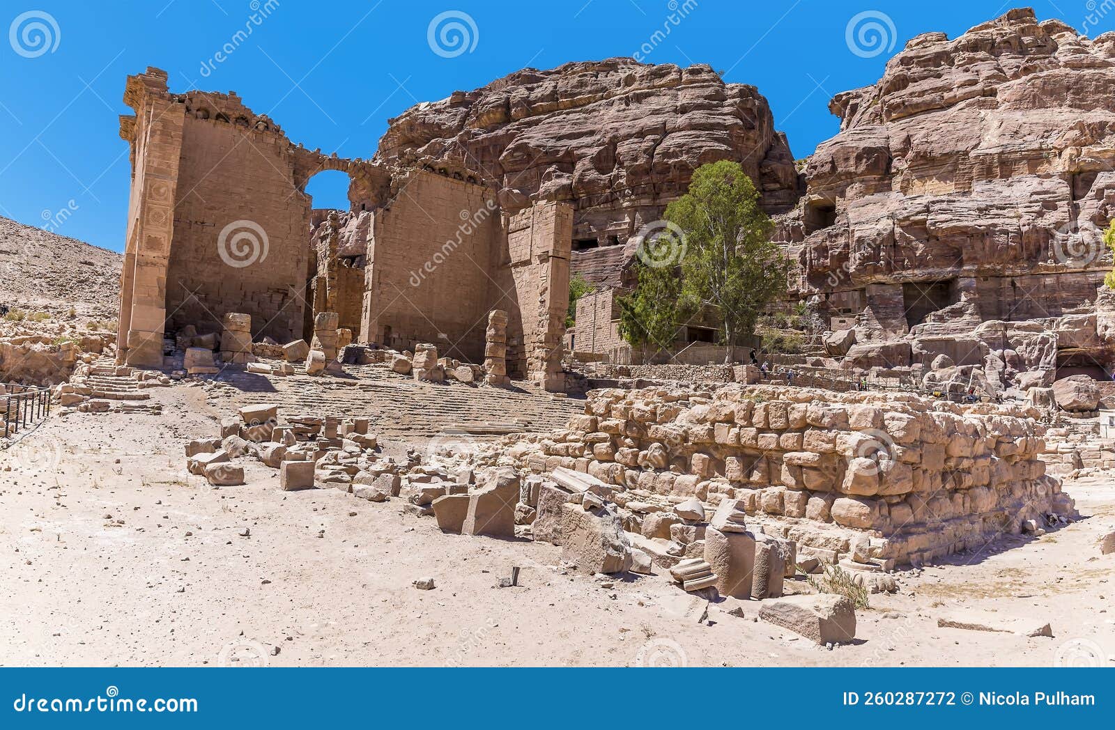 A View Towards the Temple Ruins and Rock Caves in the Ancient City of ... A View Towards the Temple Ruins and Rock Caves in the Ancient City of ...