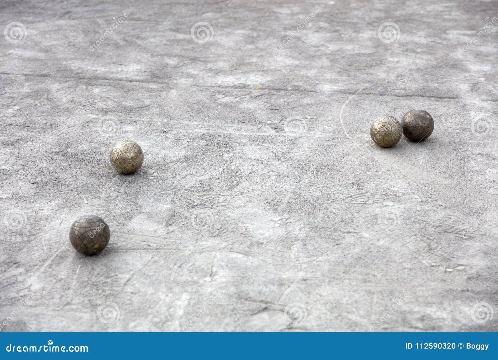 Bocce balls on the ground stock photo. Image of seasonal - 112590320