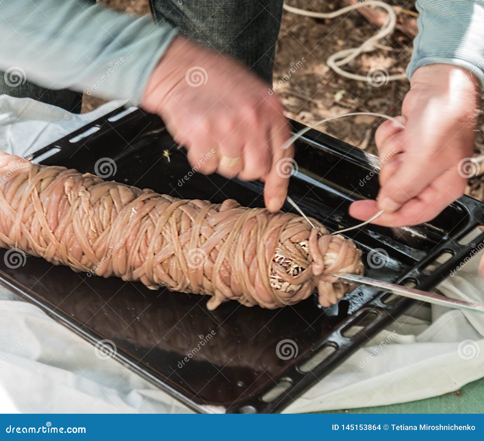 Traditional Greek Meat Roll Kokoretsi on a Spindle Stock Photo - Image ...