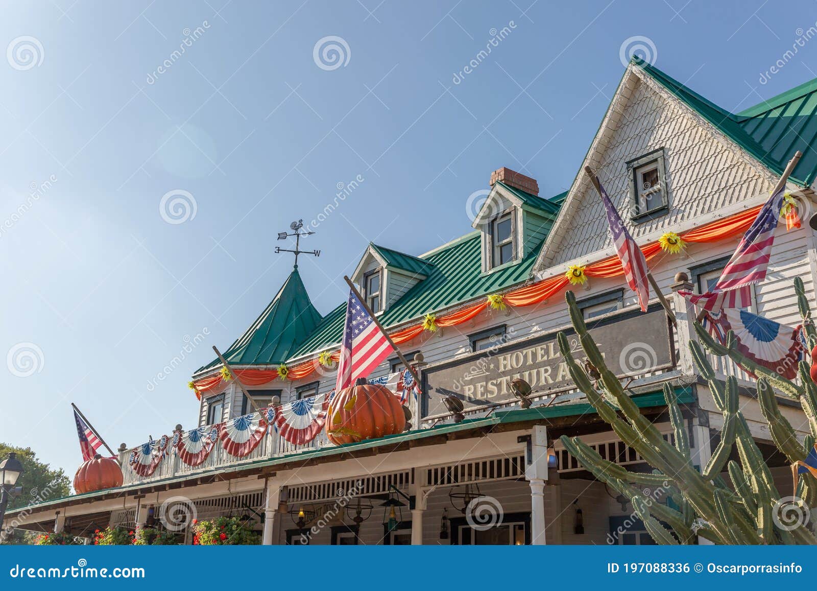 View of a Traditional US Building with Various Flags on the Facade ...