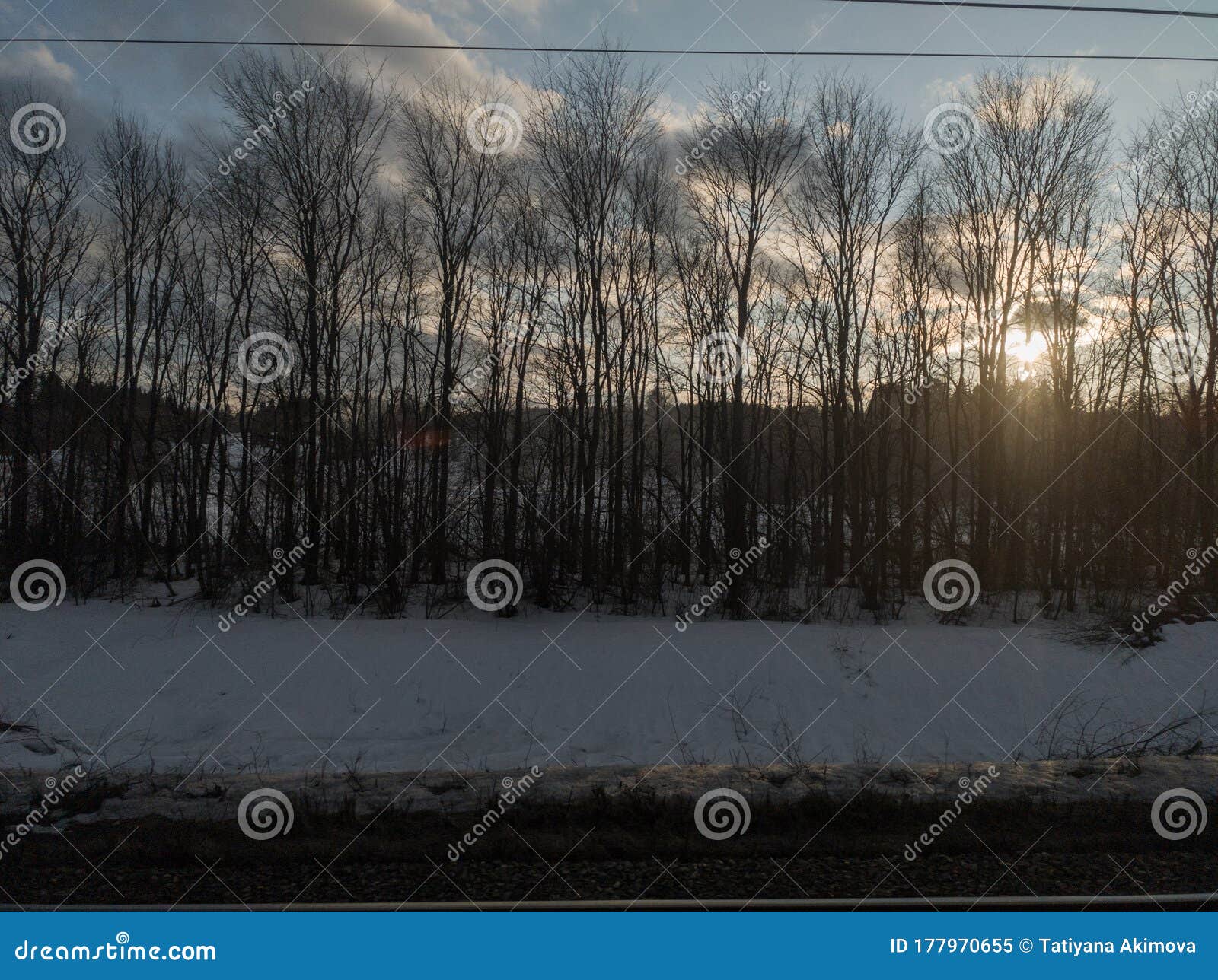 View from the Train Window on the Nature of the Urals. Blue Sky Snow ...