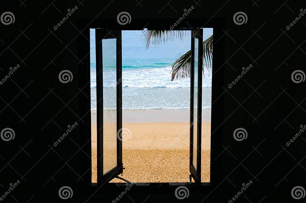 View of a Tropical Beach and Palms through an Open Window Stock Photo ...