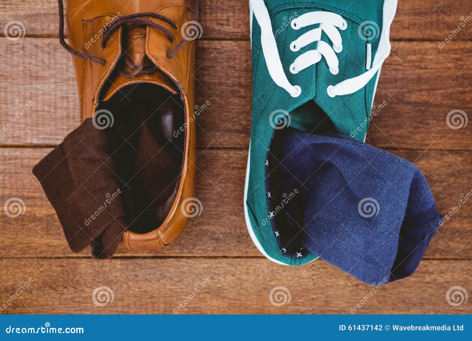 View of Two Different Shoes Stock Photo - Image of wood, socks: 61437142
