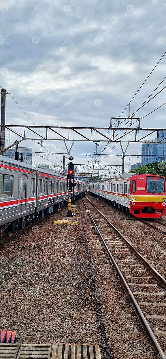 View of Two Trains Passing Back and Forth at the Station with a Traffic ... View of Two Trains Passing Back and Forth at the Station with a Traffic ...