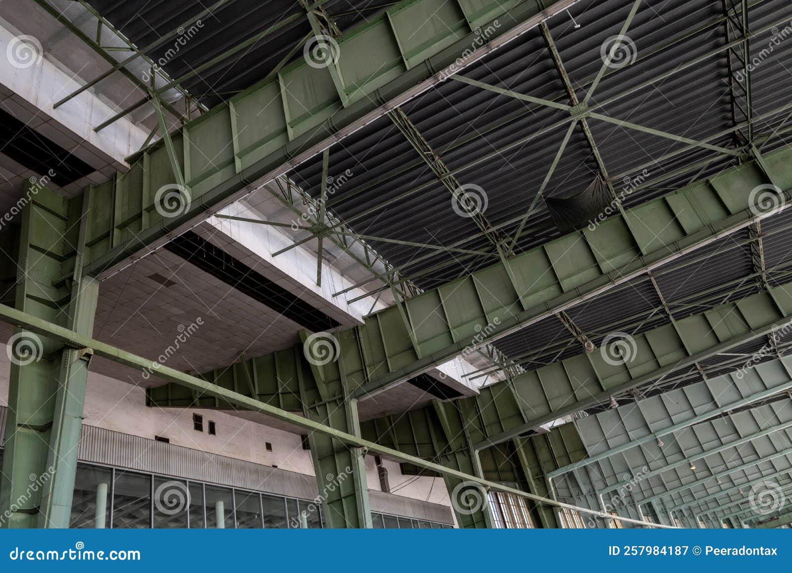 View Under High Ceiling of Open Interior Space with Huge Steel Truss ...