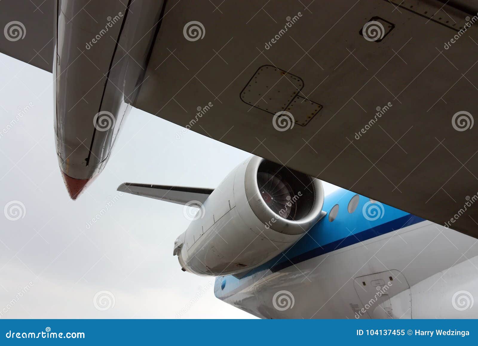 View from Under the Wing of a Large Airplane with Jet Engine Stock ...