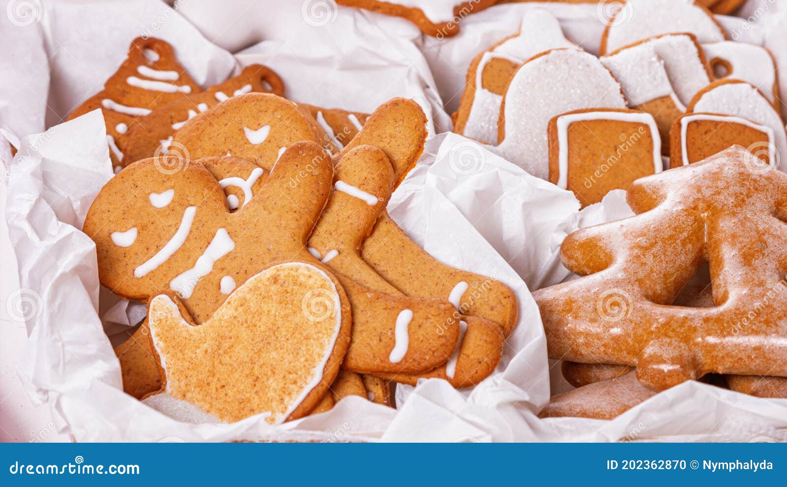 View of the Unpacked Christmas Present with Sweets Inside White Paper ...