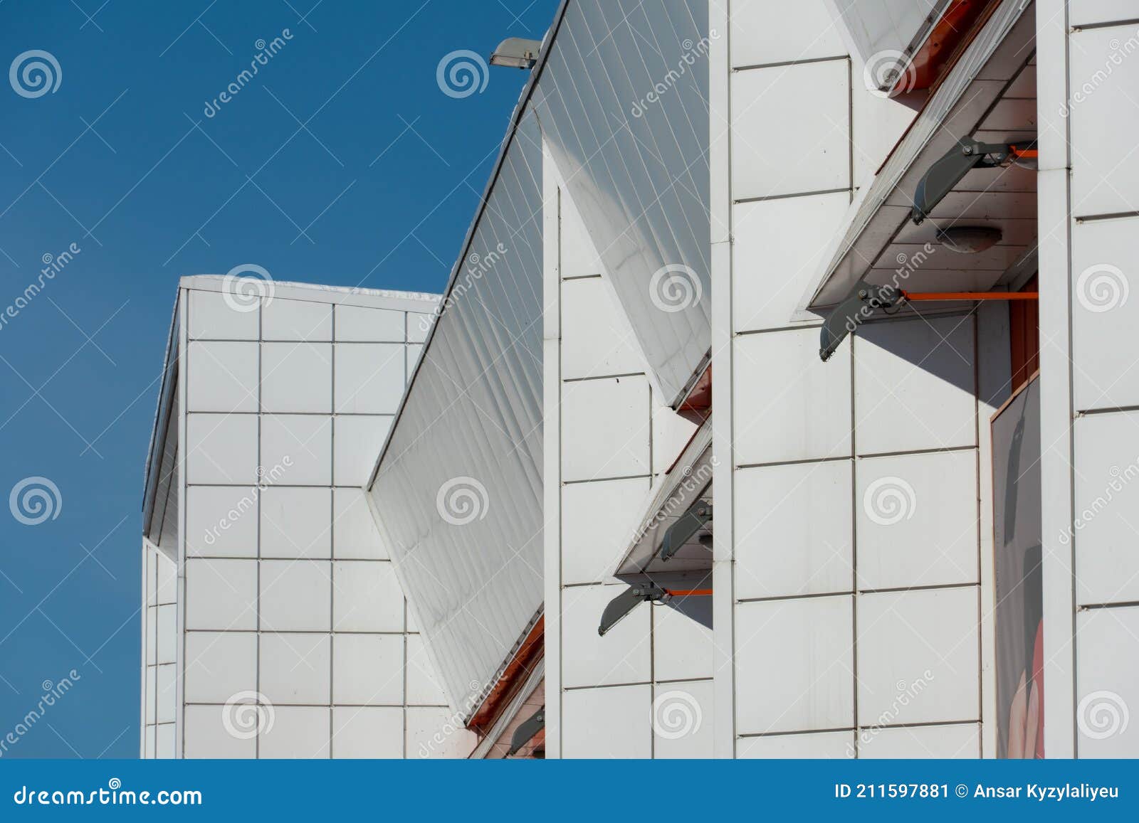 View of an Unusual Building Made of White Square Slabs. White Wall ...