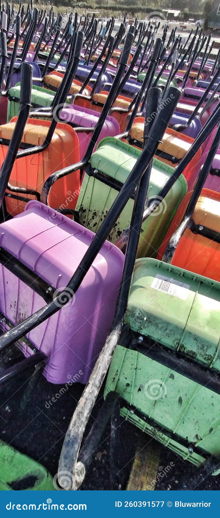 View of Up of Set of Colorful Wheelbarrows Stock Image - Image of tire ...