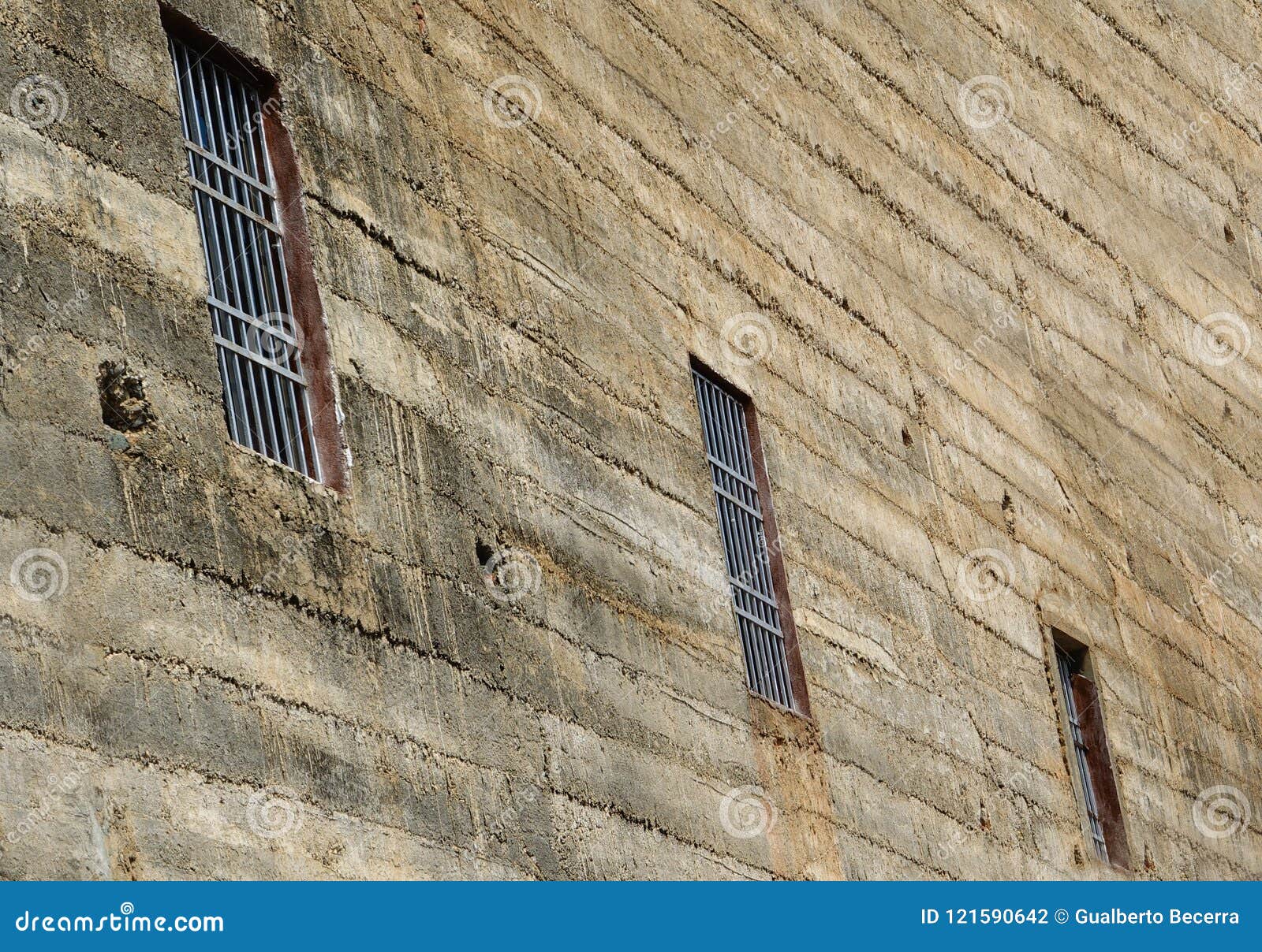 View of a Very Rustic Wall with Barred Windows Stock Photo - Image of ...