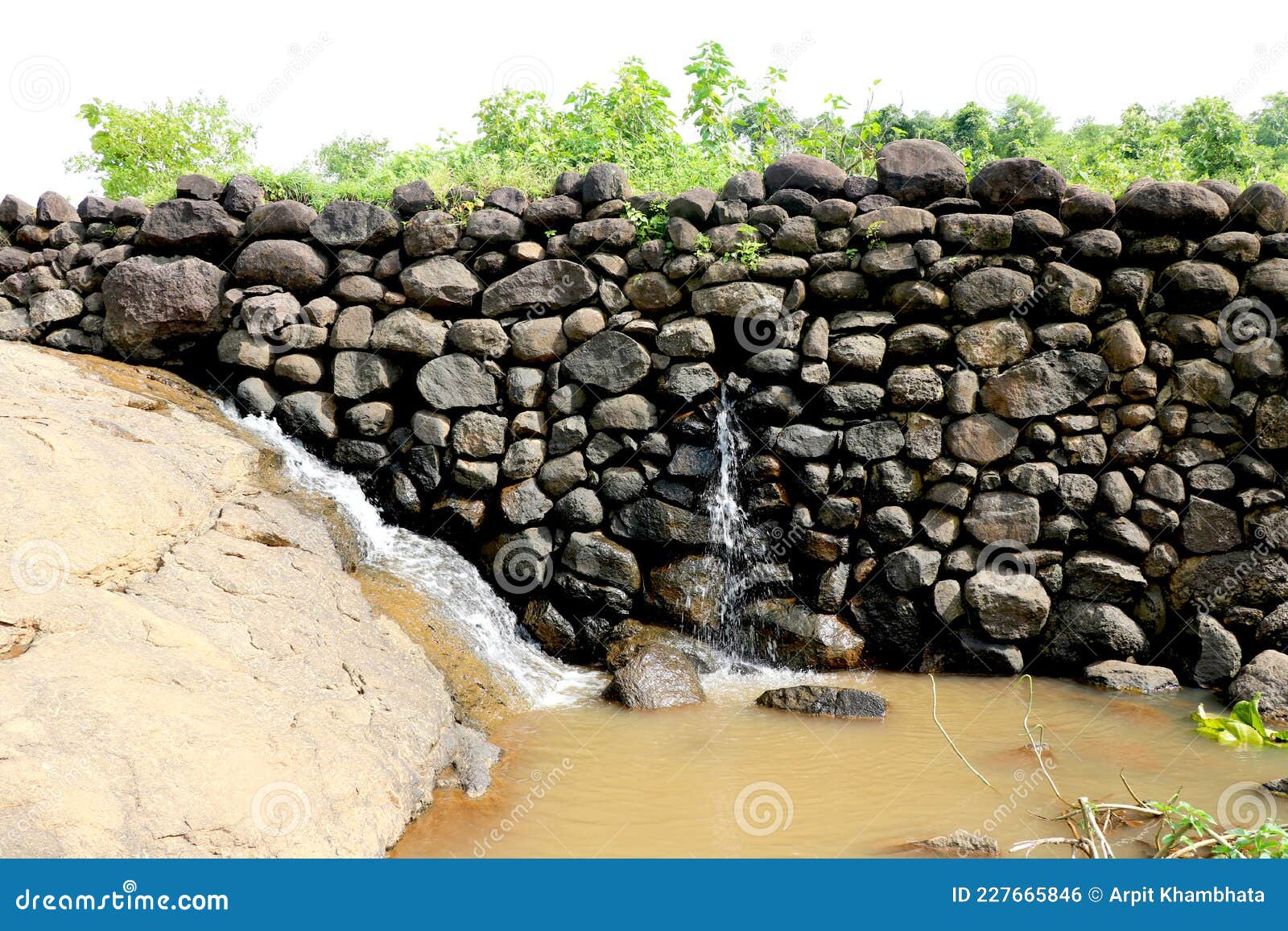 View of Water Falling from Small Stone Wall Stock Photo - Image of ...