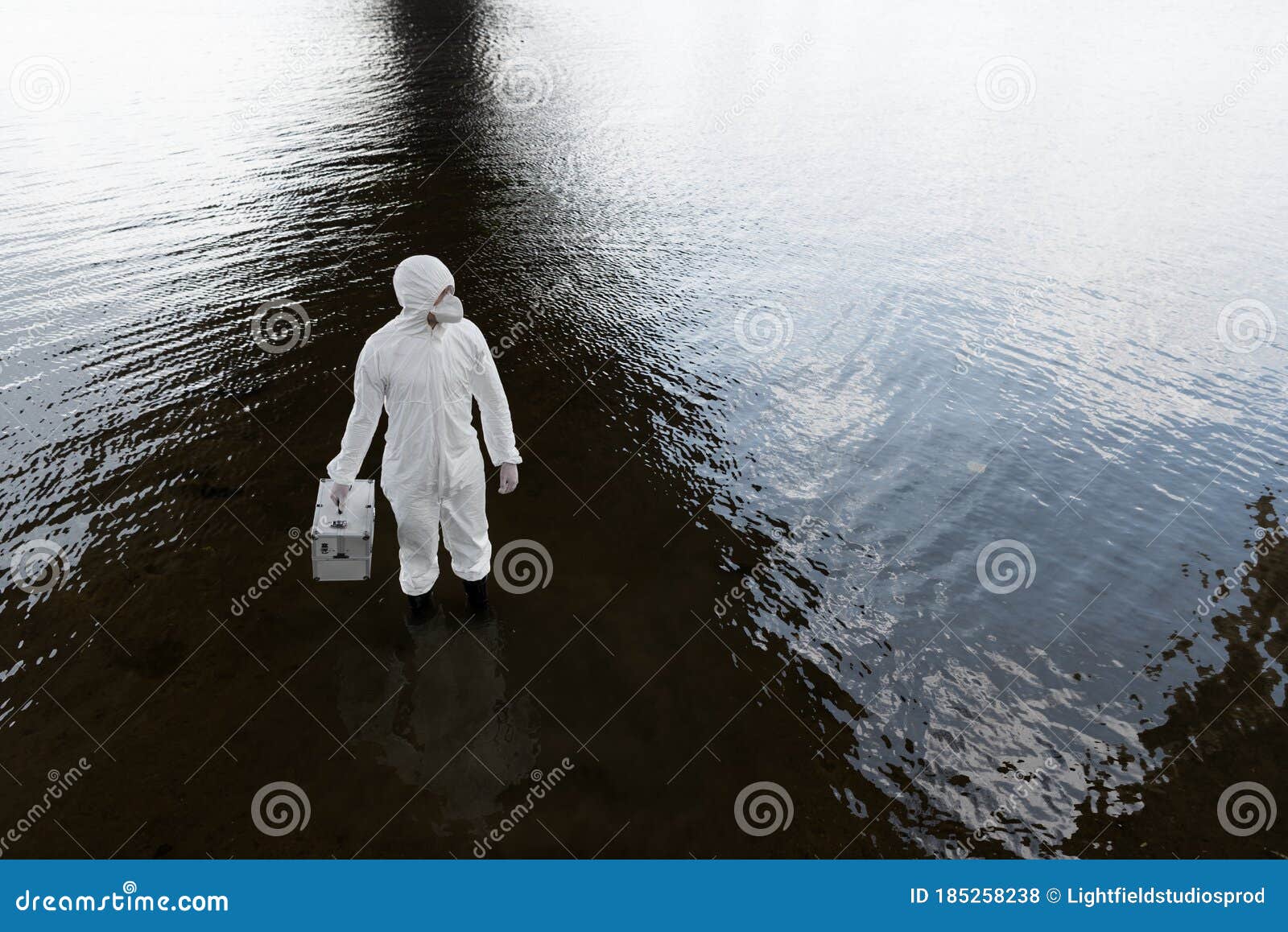 View of Water Inspector in Protective Costume Holding Inspection Kit at ...