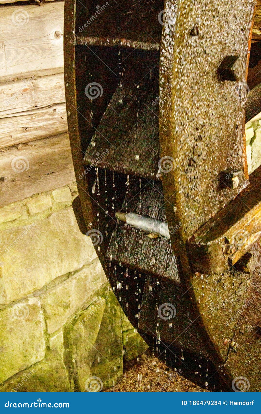 A Water Wheel in Operation at a Water Mill Stock Photo - Image of space ...