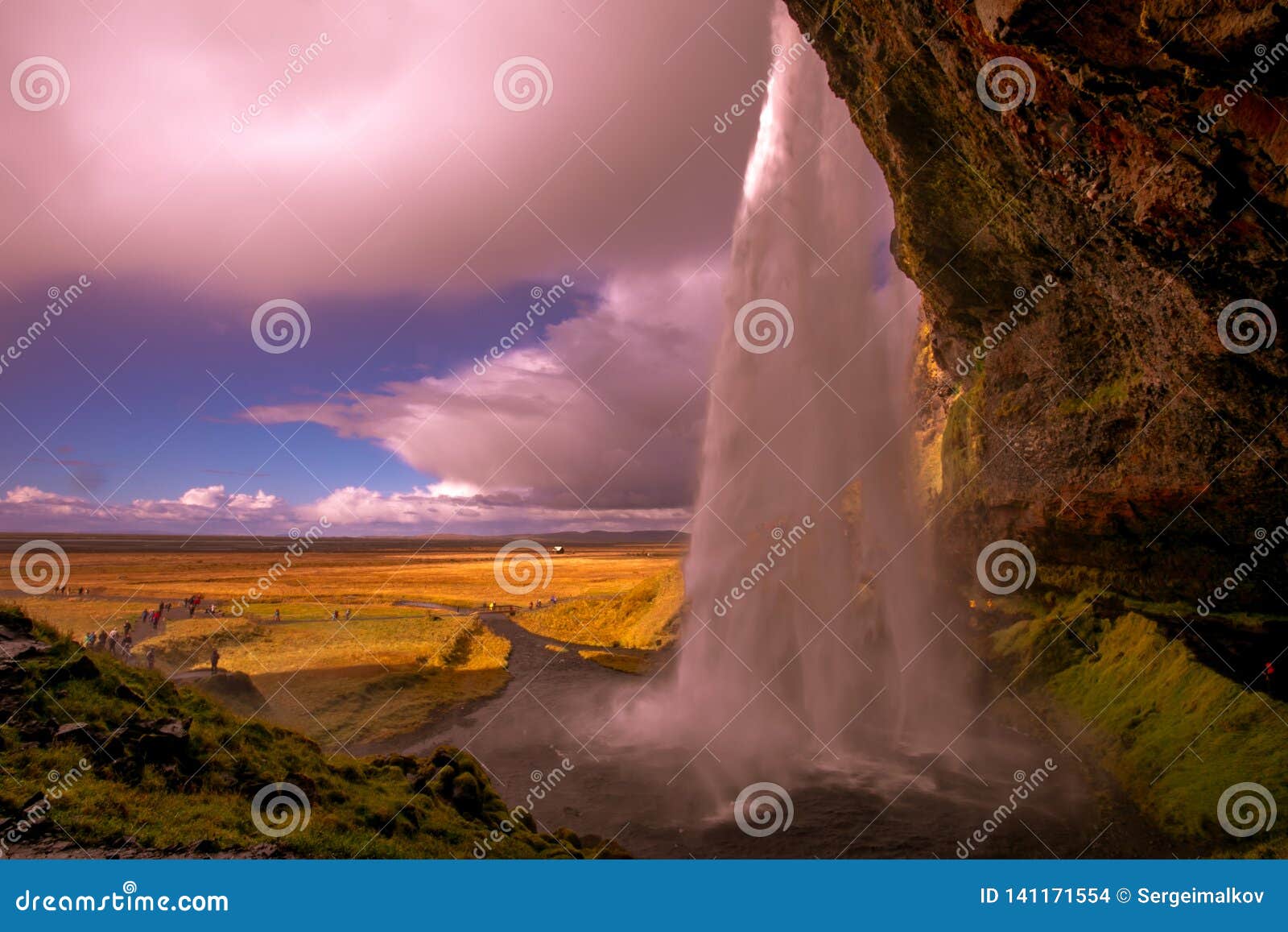 View of a Waterfall in Iceland. Water Flows from Top To Bottom Stock ...