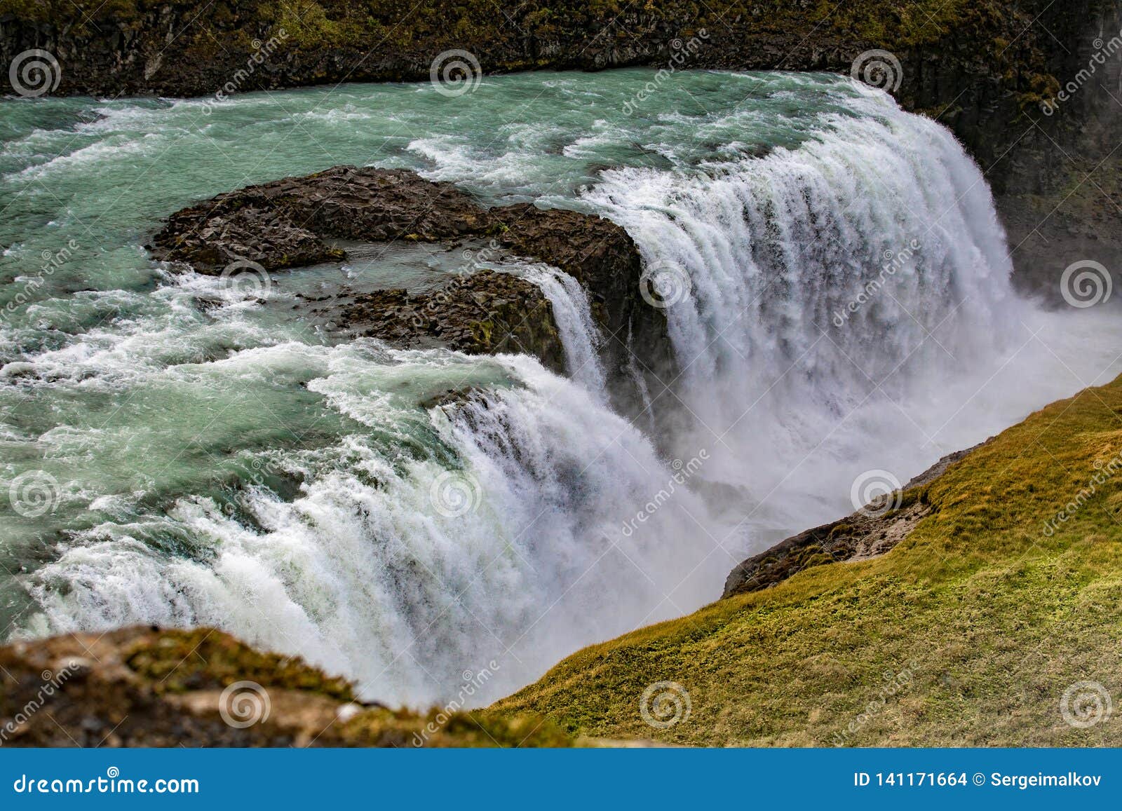 View of a Waterfall in Iceland. Water Flows from Top To Bottom Stock ...