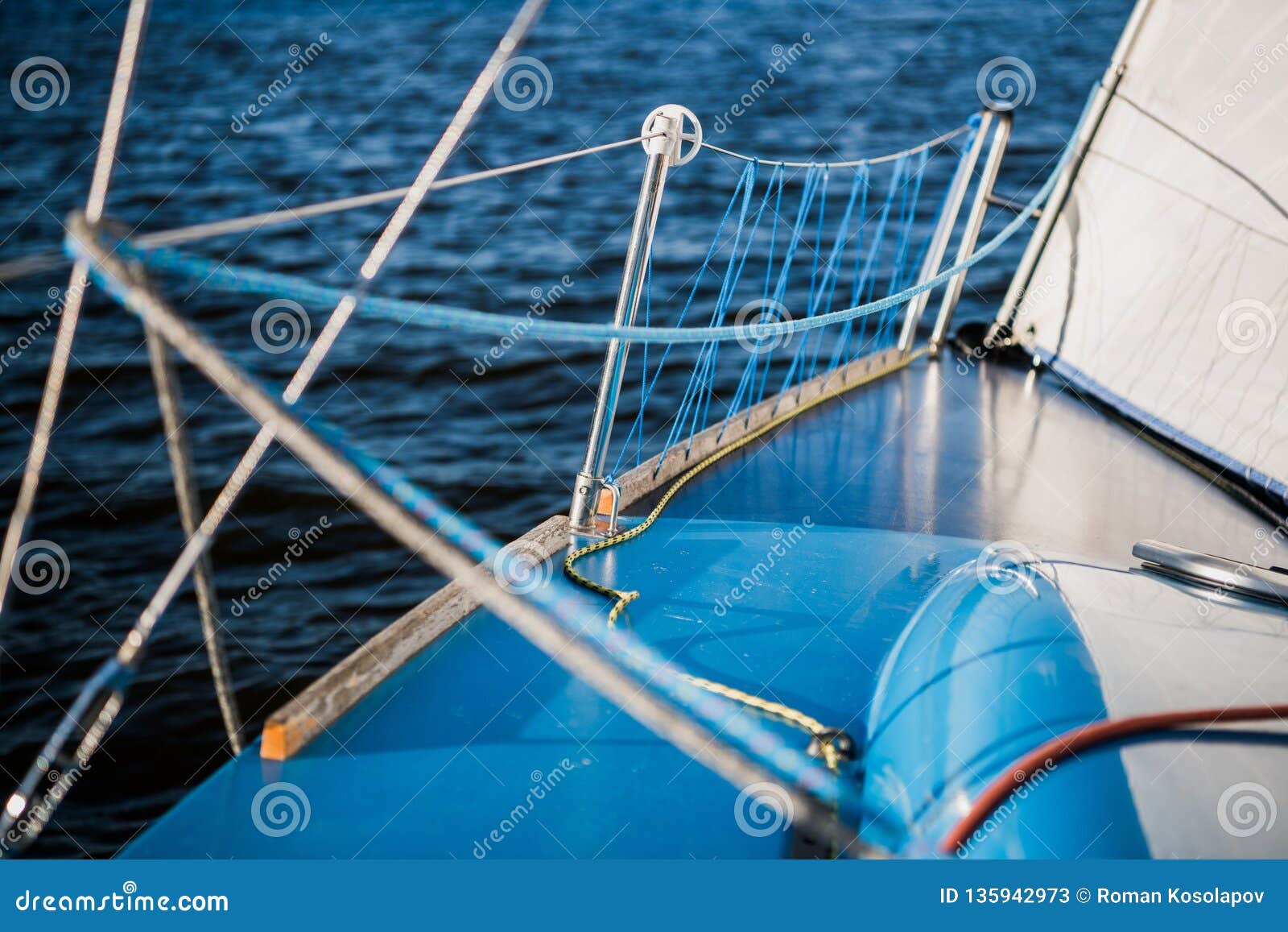 View of Waves from through Rope Railing of a Keeling Sailboat. Stock ...