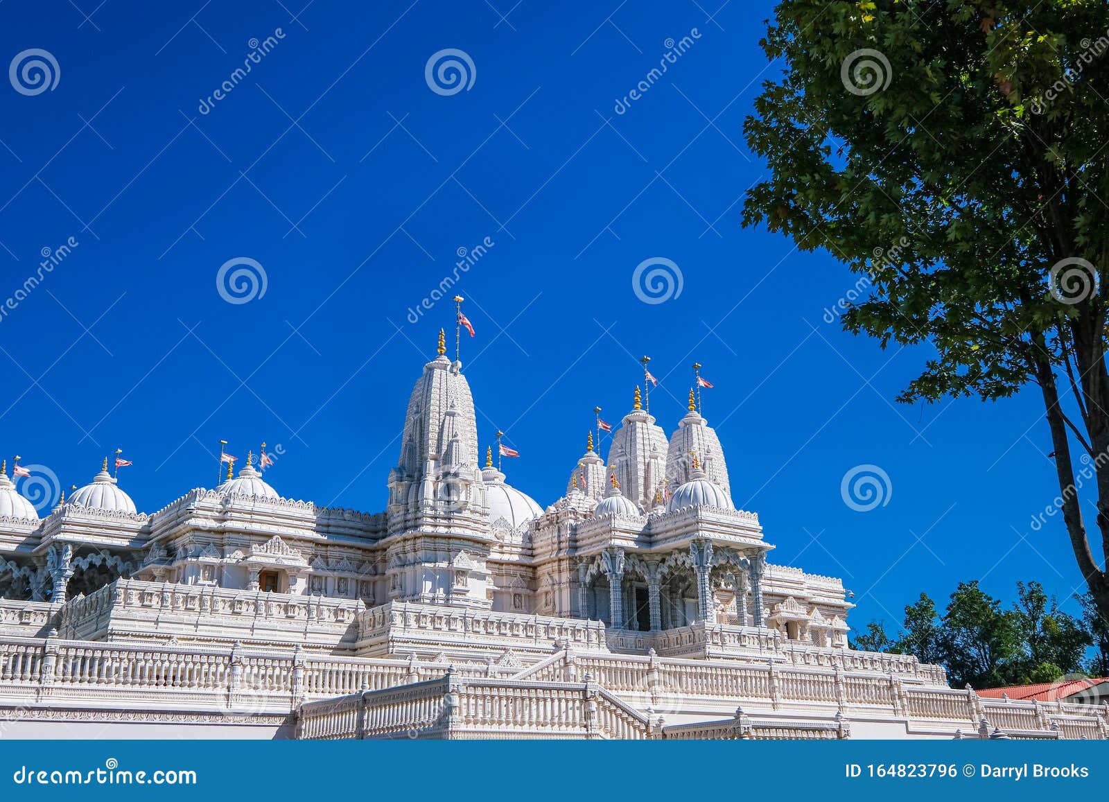 Flags Flying Over Mandir stock photo. Image of architecture - 164823796