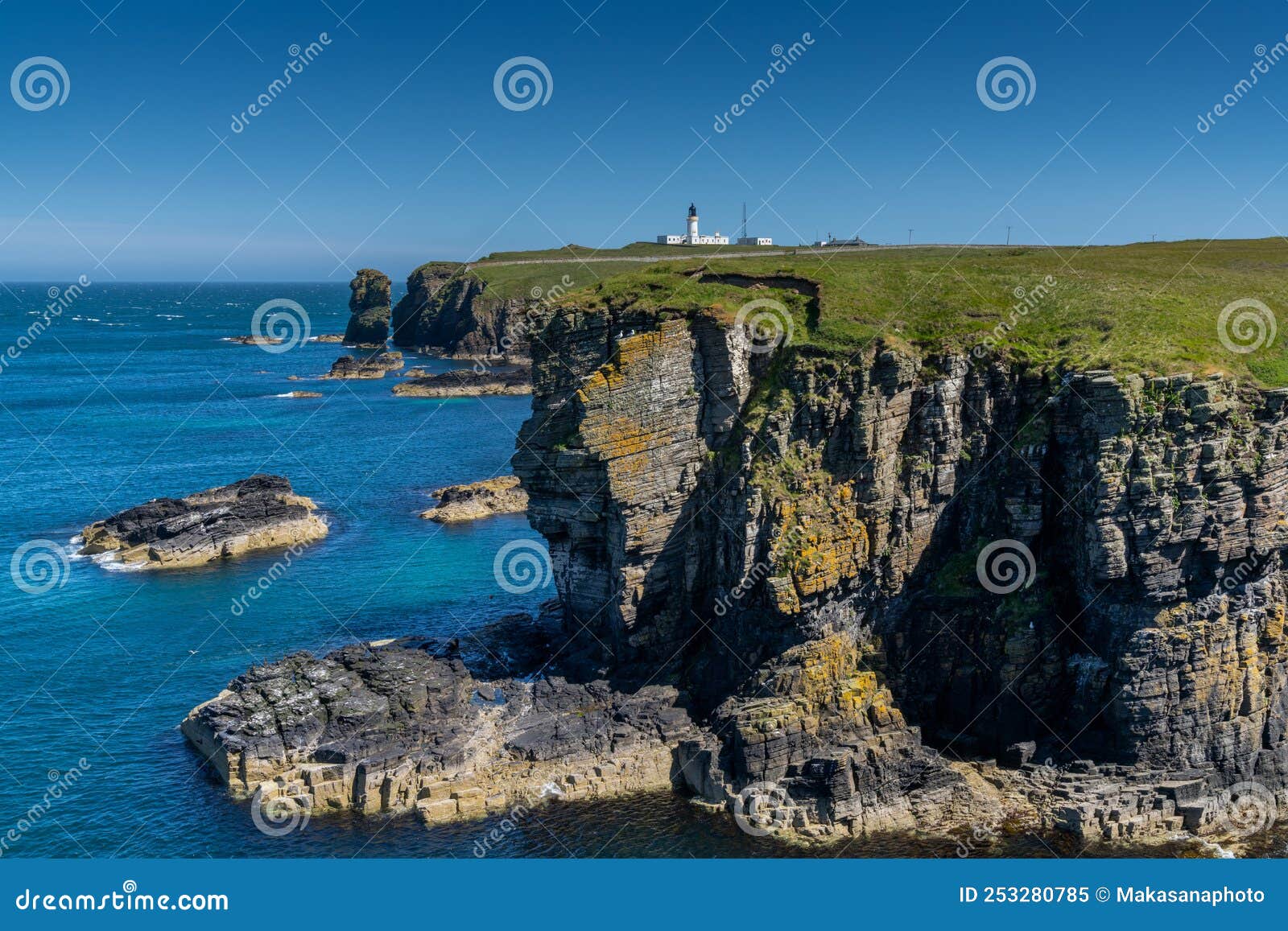 View of the Wild Caithness Coast and the Noss Head Lighthouse Stock ...