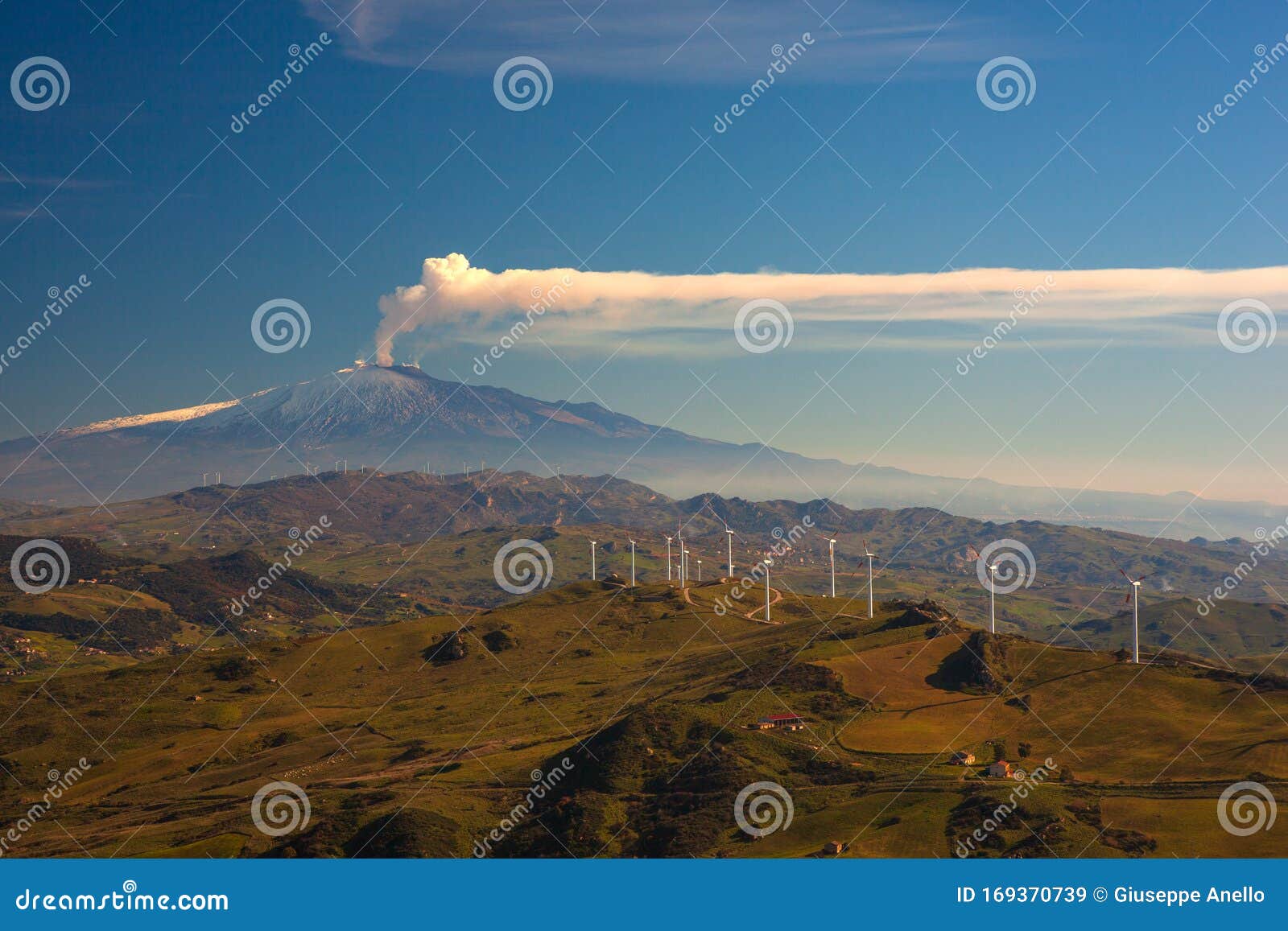 View of Windmills and the Mount Etna Volcano Stock Image - Image of ...