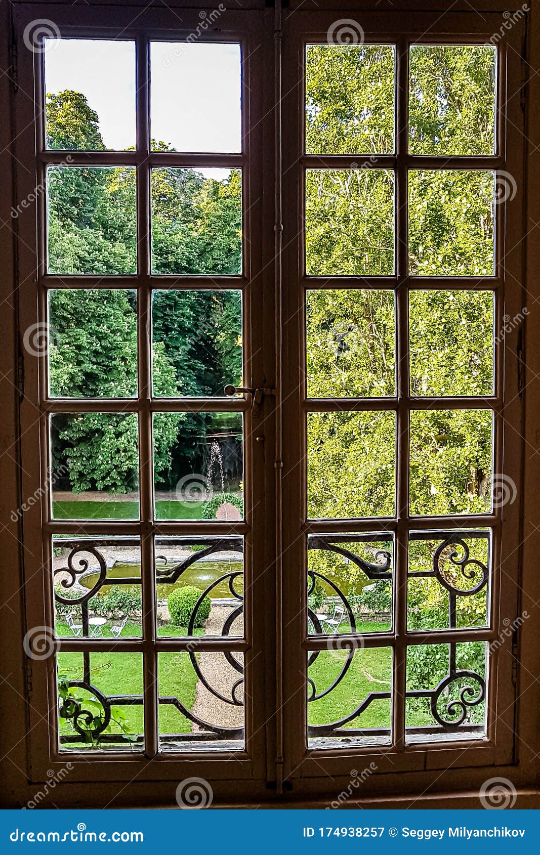 View of the Regular Park through a Window with Bars. Stock Image ...