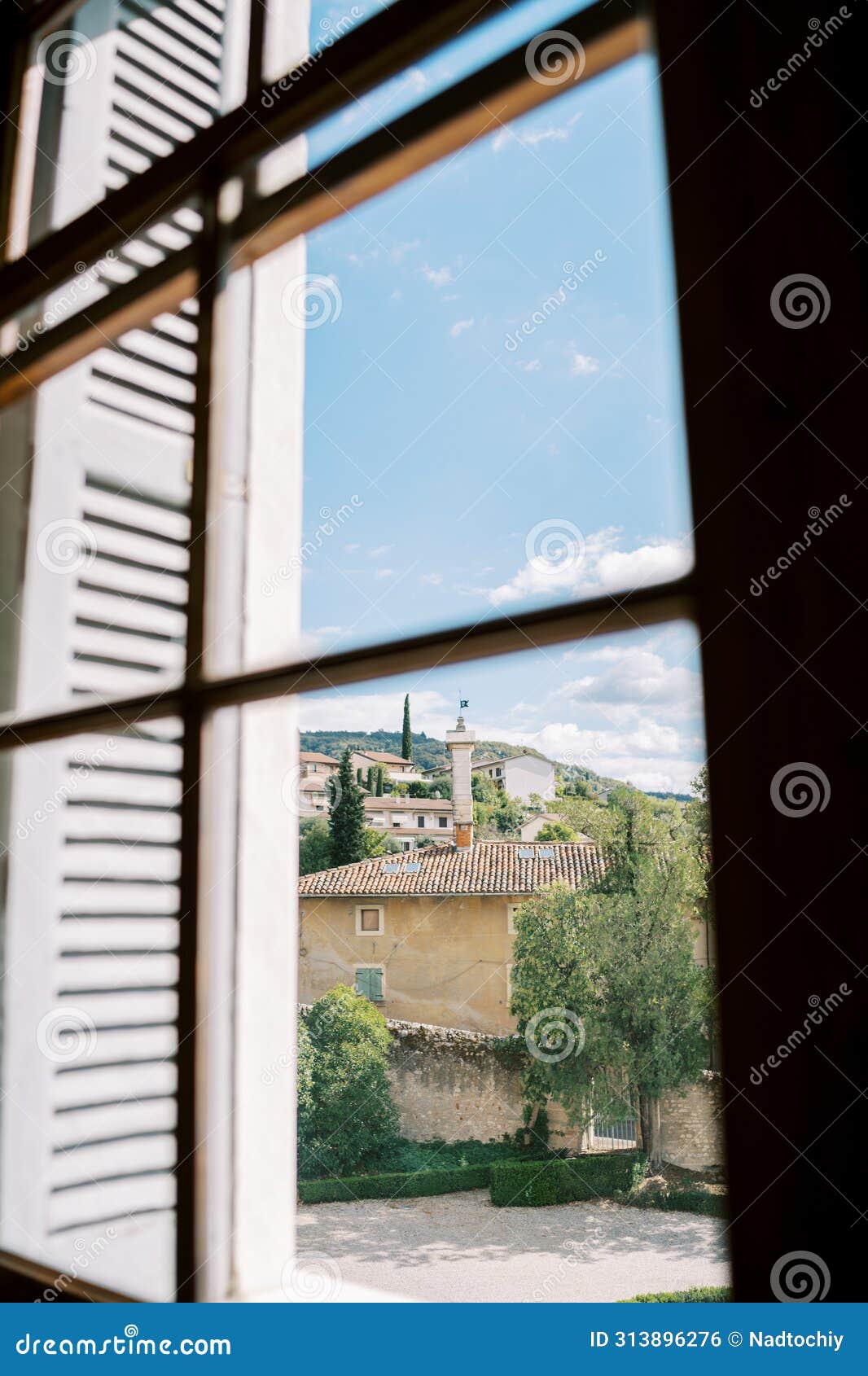 View from the Window of the Courtyard and Ancient Mansions Against the ...