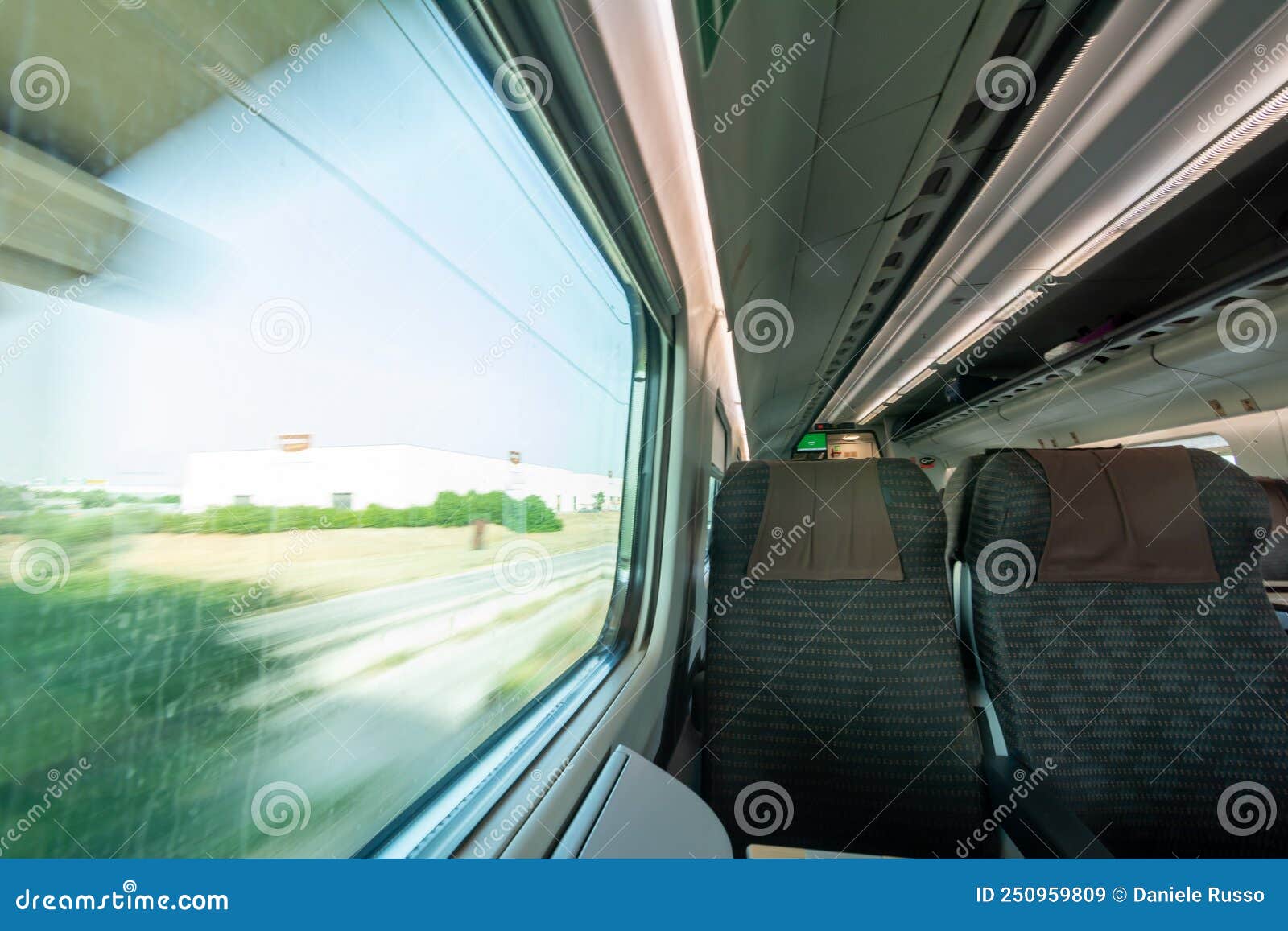 View of a Window Scrolling the Landscape Inside High Speed Train Stock ...