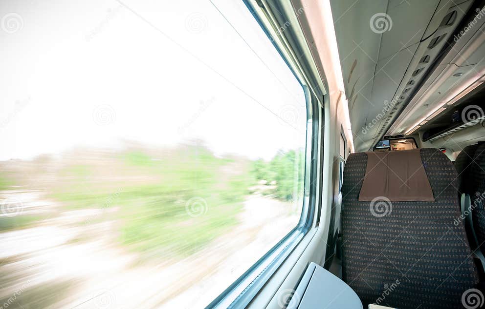 View of a Window Scrolling the Landscape Inside High Speed Train Stock ...