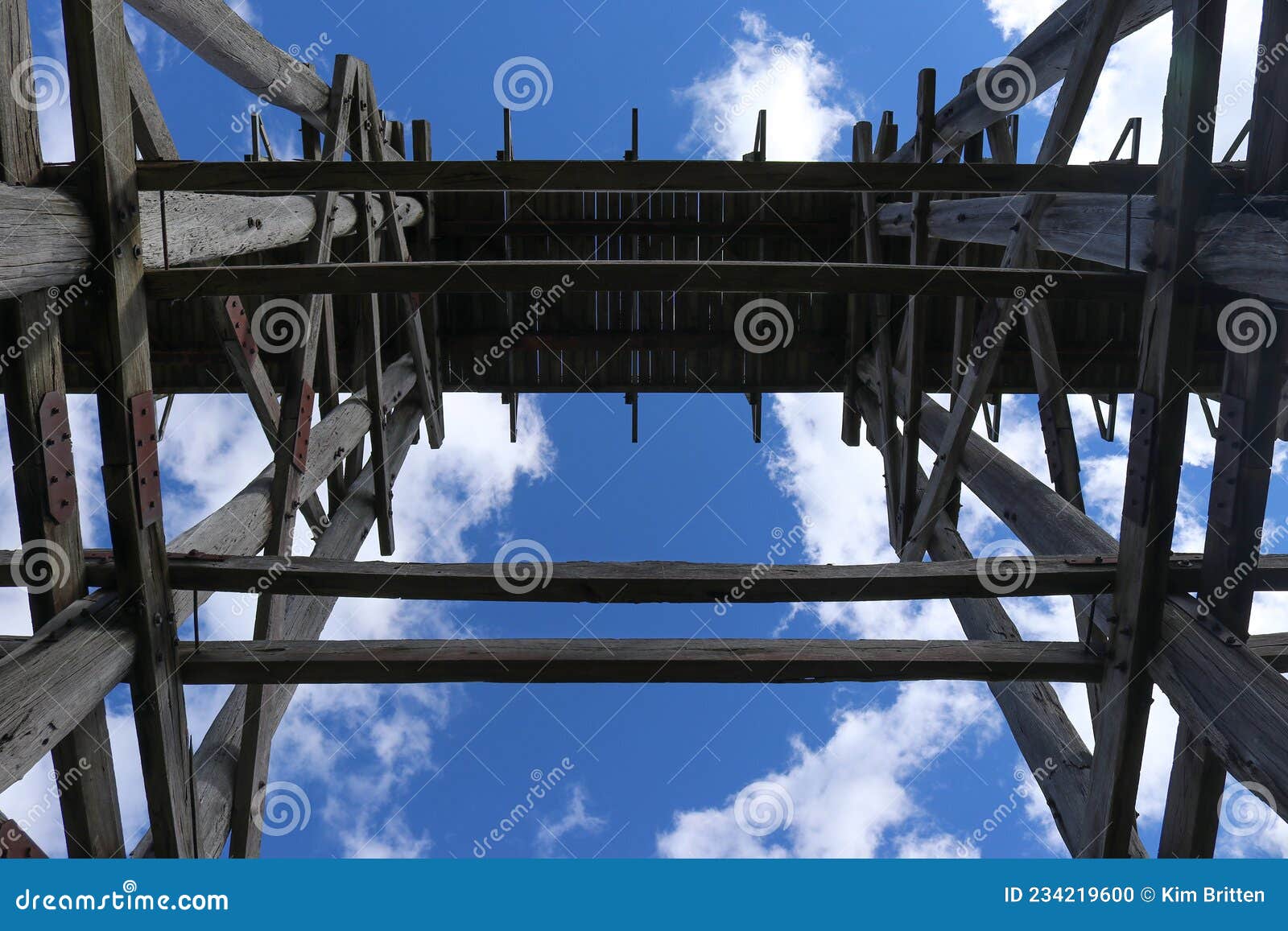 A View of a Wooden Railway Trestle Bridge from Underneath Perspective ...