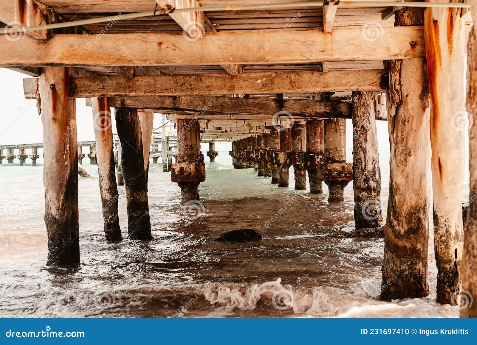 View of Wooden Under Pier Bridge Over Waves of Sea Stock Photo - Image ...