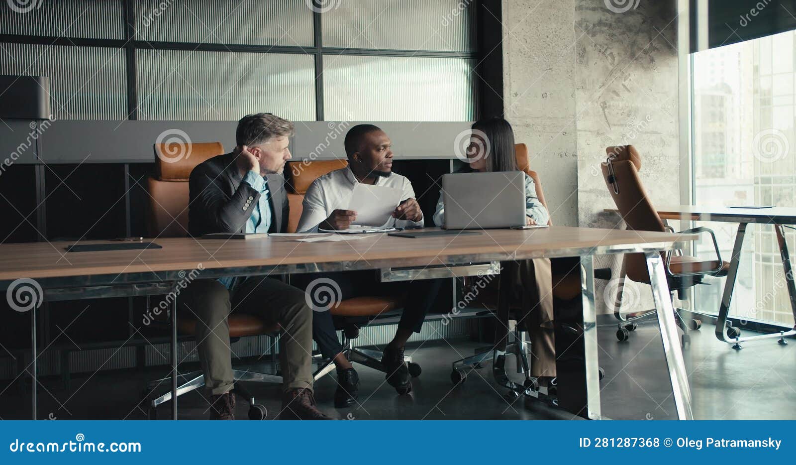 A View of the Work of a Successful Multiracial Trio. Successful Company ...