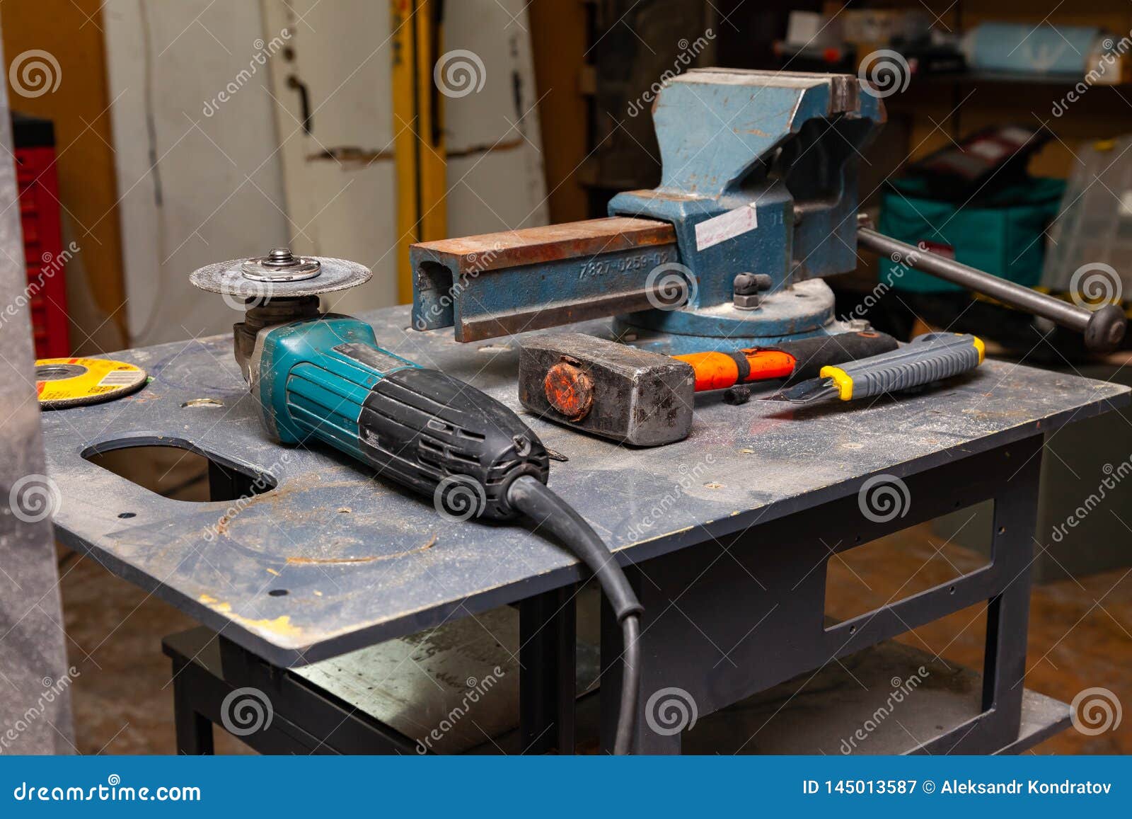View of a Workbench with a Set of Tools Consisting of a Large Heavy ...