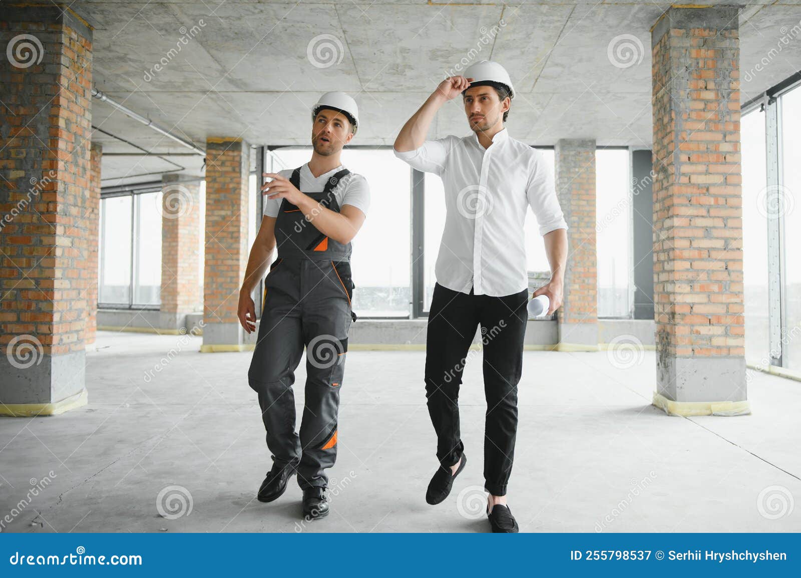 View of a Worker and Architect Watching Some Details on a Construction ...