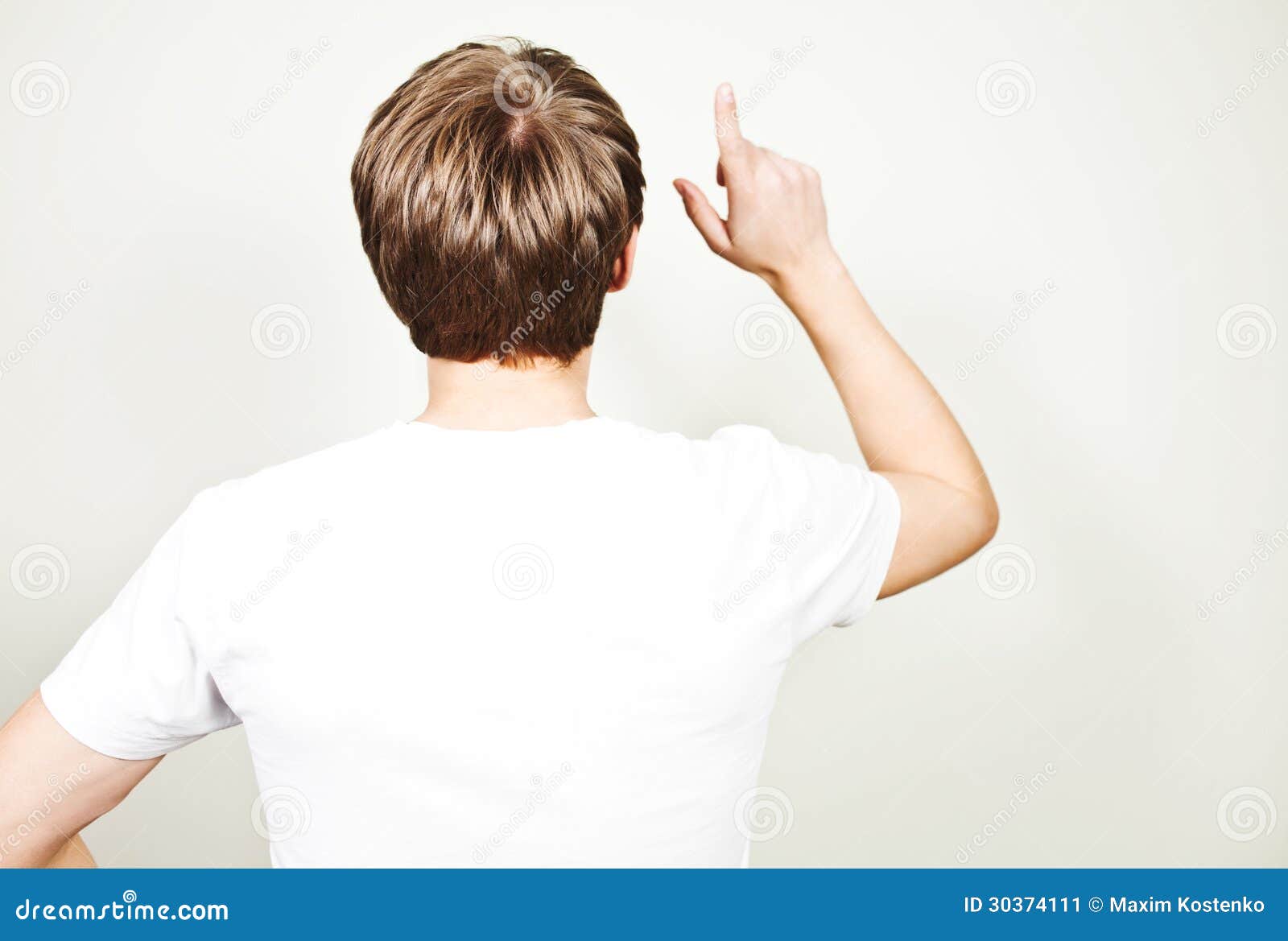 View of Young Man Pointing Up Stock Image - Image of gesturing, showing ...
