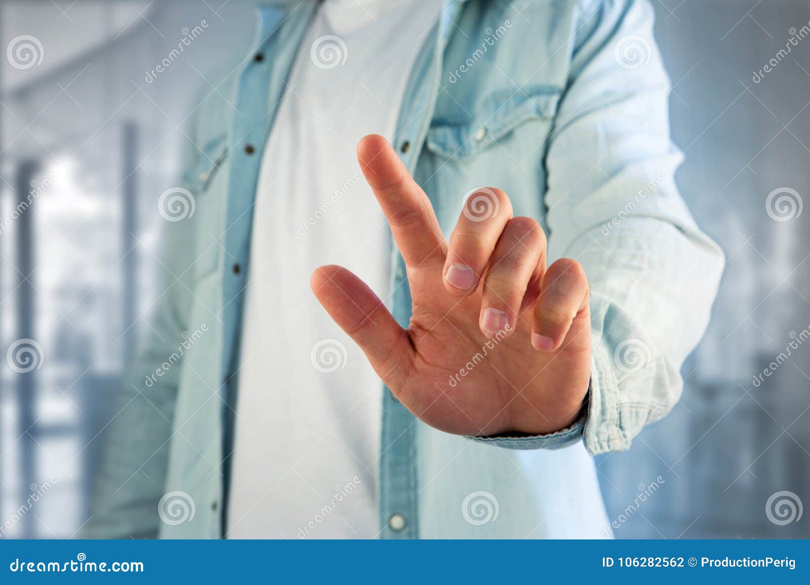 Young Man Touching with His Finger an Interface at the Office Stock ...