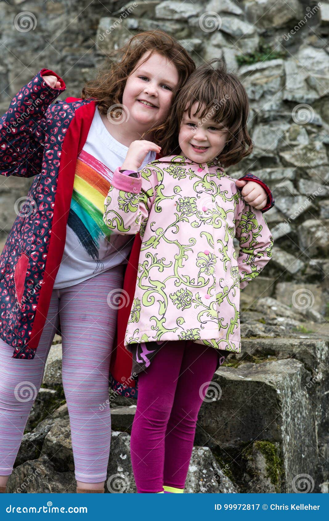 Young Sibling Girls Portrait Looking and Smiling at the Camera. Stock ...
