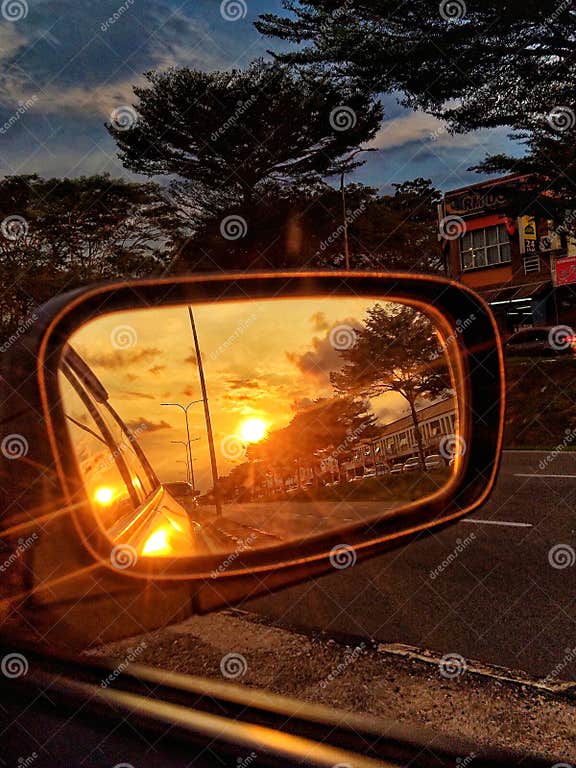 Viewing Sunset from Side Mirror of Car. Stock Photo - Image of ...