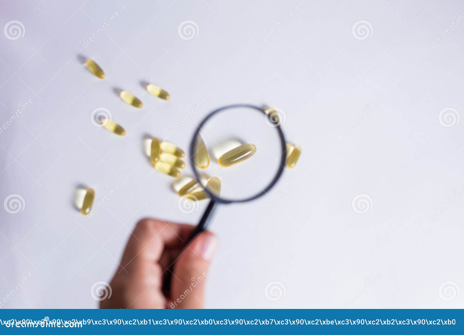 Viewing Tablets through a Magnifying Glass on a White Background Stock ...