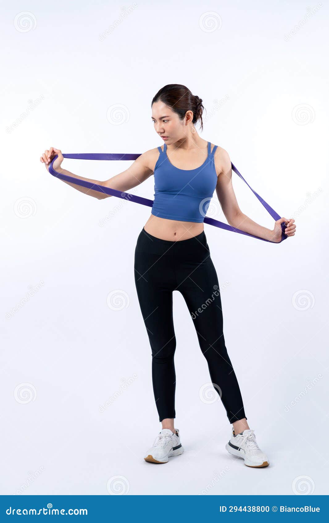 Vigorous Energetic Woman In Sportswear Portrait Stretching Resistance