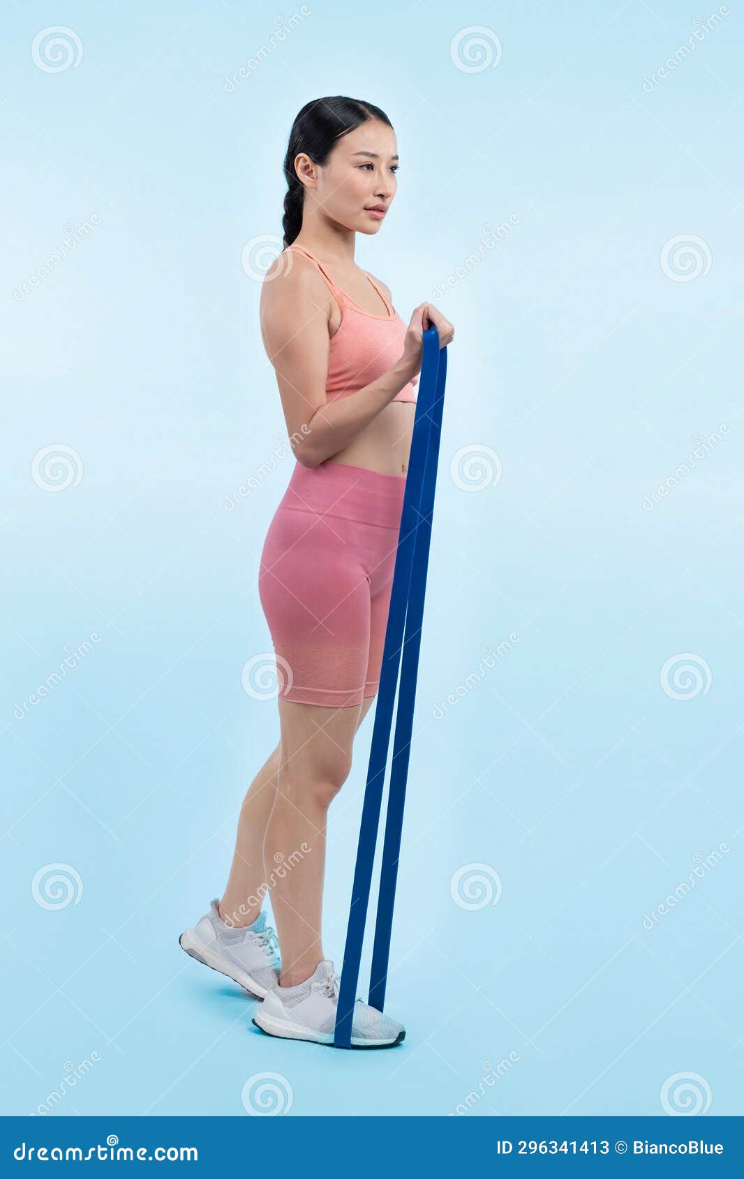 Vigorous Energetic Woman In Sportswear Portrait Stretching Resistance