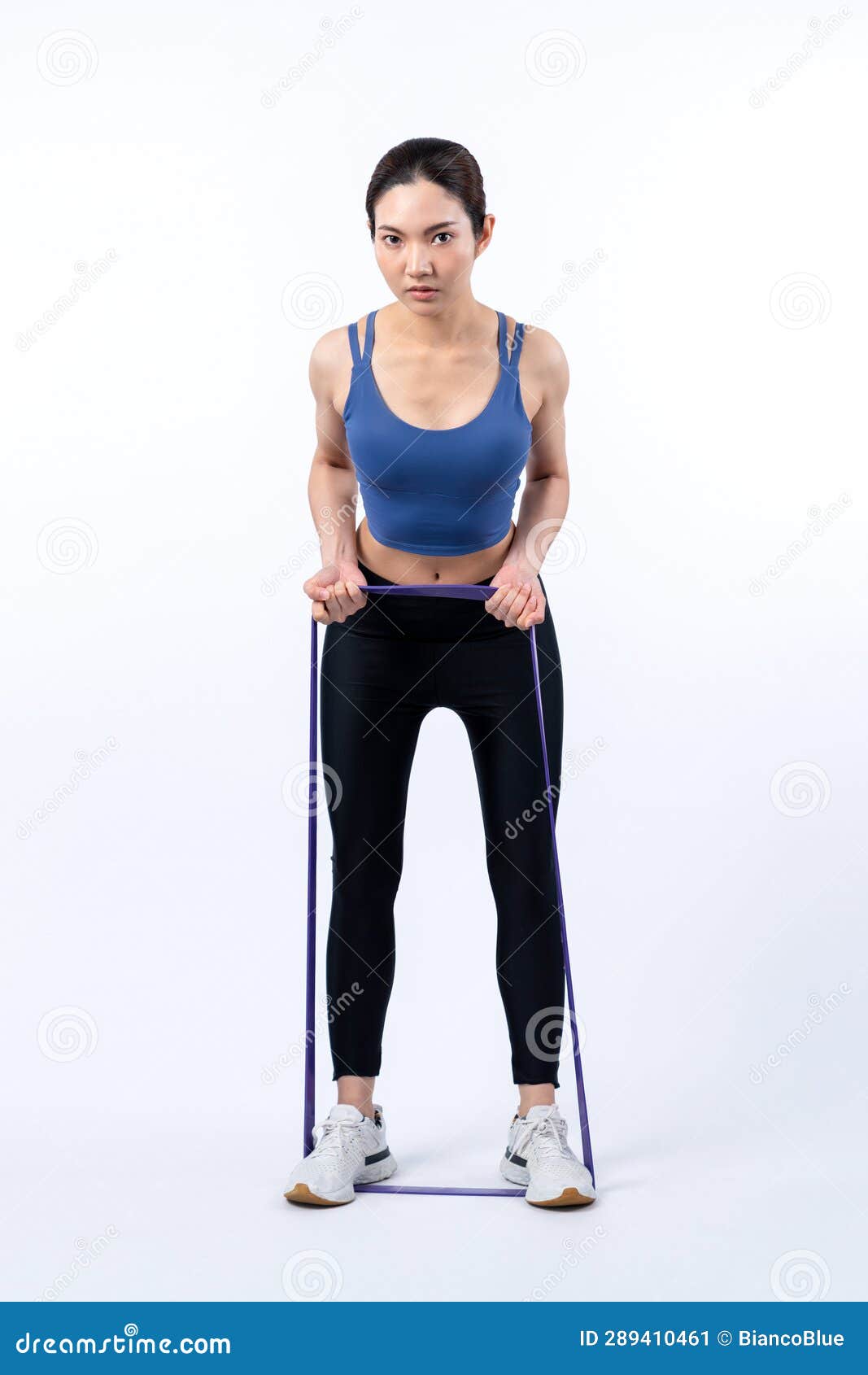 Vigorous Energetic Woman In Sportswear Portrait Stretching Resistance
