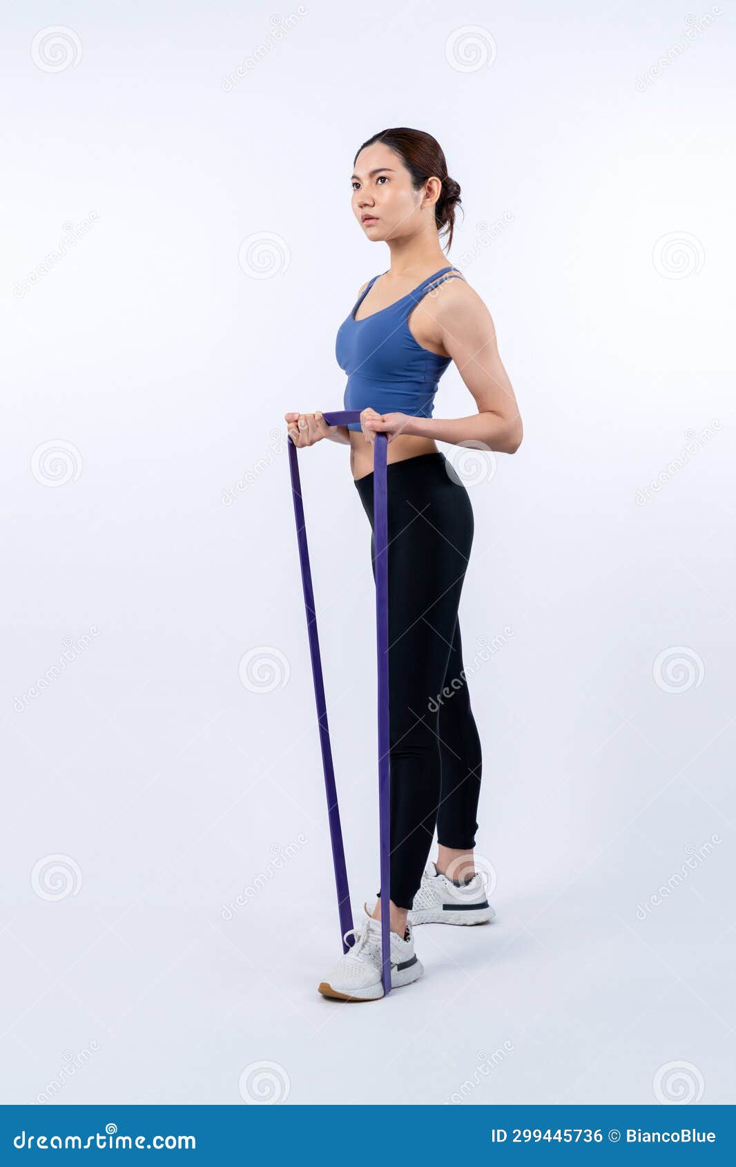 Vigorous Energetic Woman In Sportswear Portrait Stretching Resistance