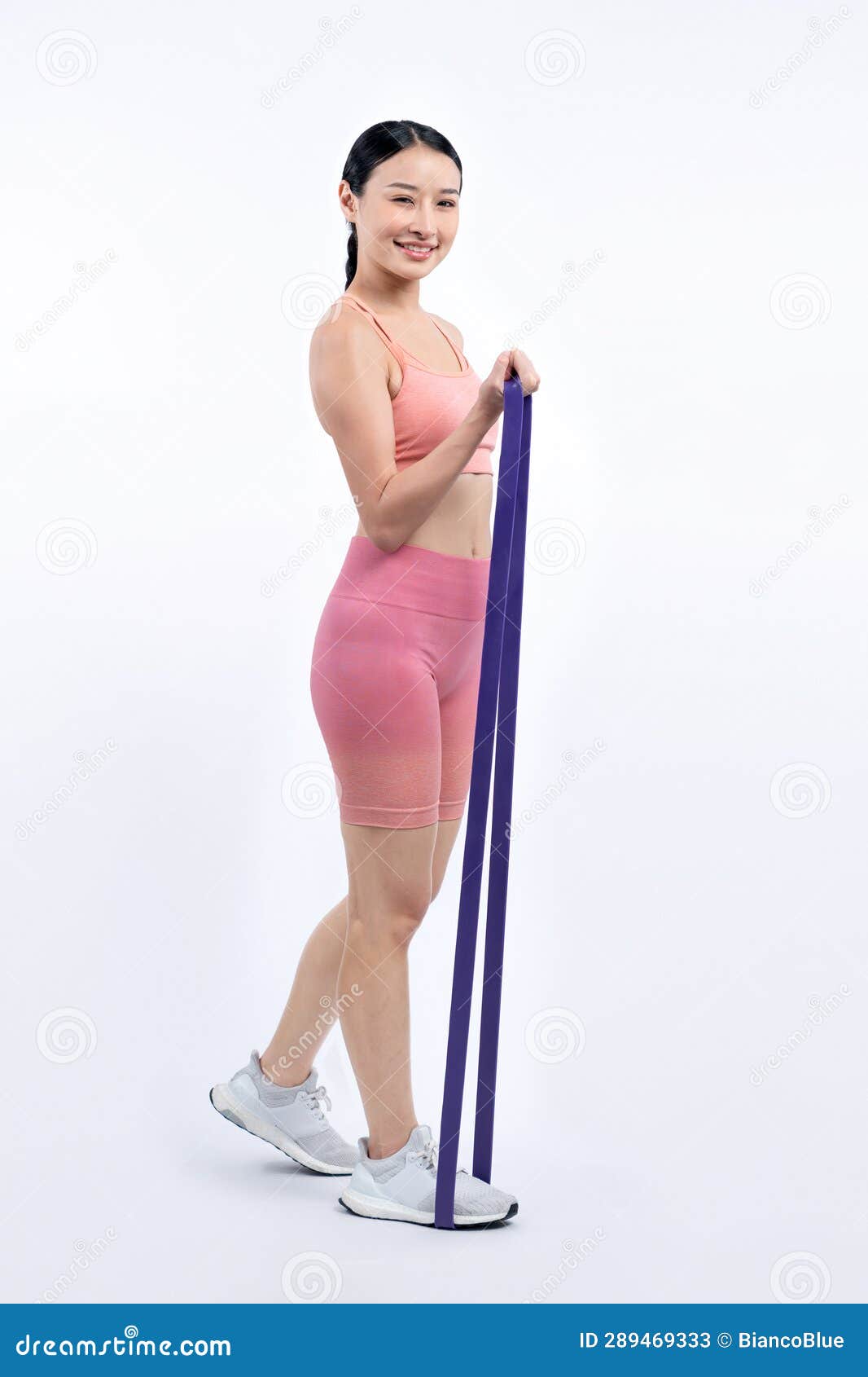 Vigorous Energetic Woman In Sportswear Portrait Stretching Resistance