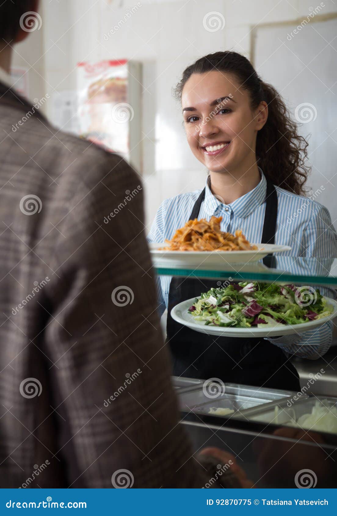 Vigorous Female Worker Serving Customer with Smile Stock Image - Image ...
