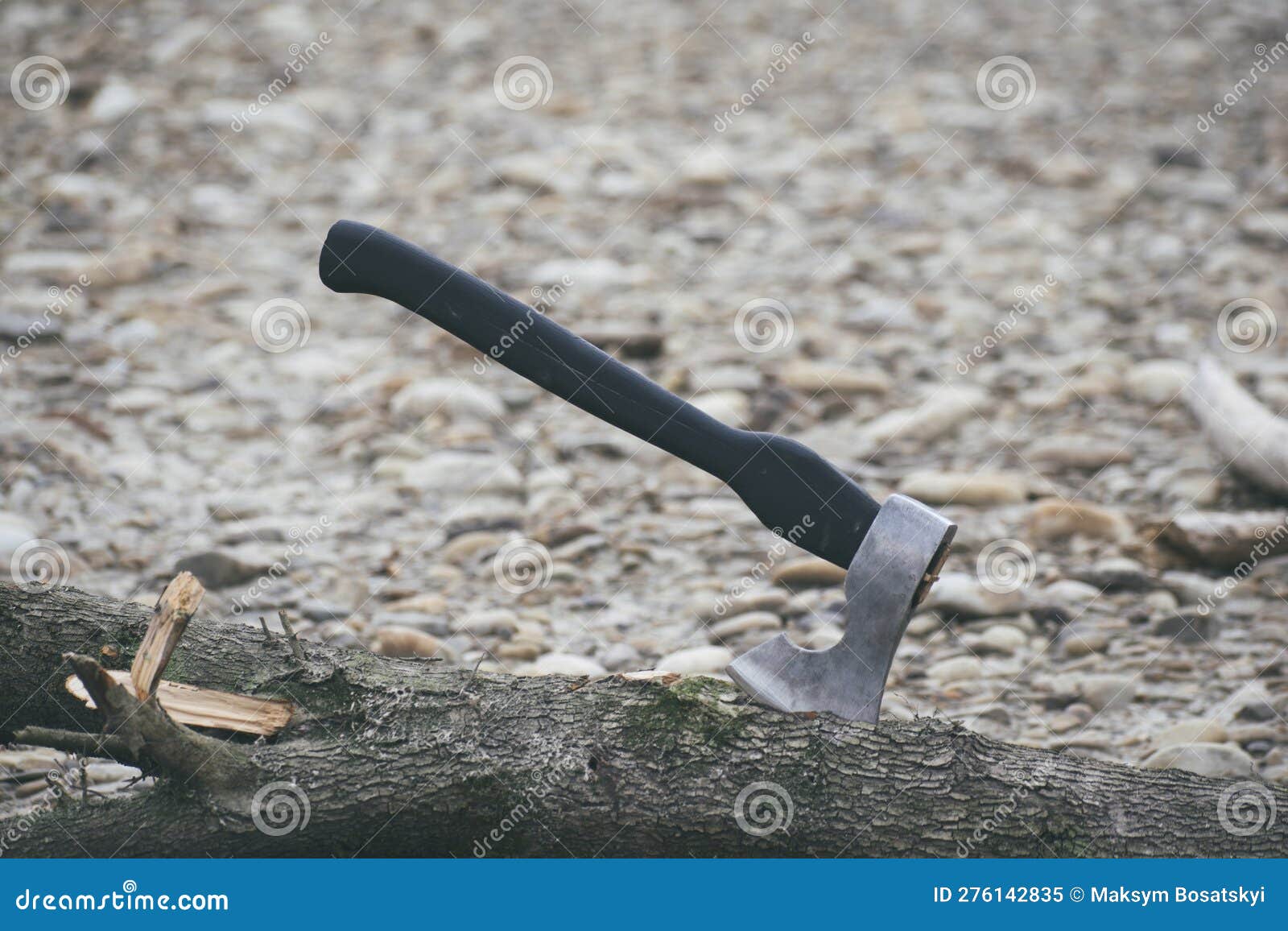 Viking Ax. an Ax Driven into a Piece of Wood. Ax in the Water Stock ...