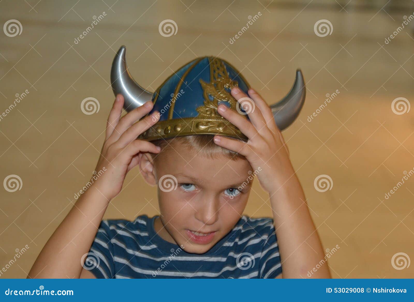 Viking Boy with the Hands on the Helmet Stock Photo - Image of hair ...