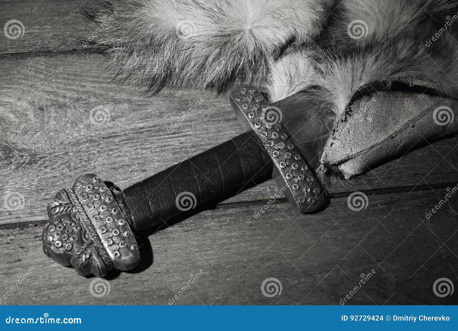 Viking sword on a fur stock photo. Image of precious - 92729424