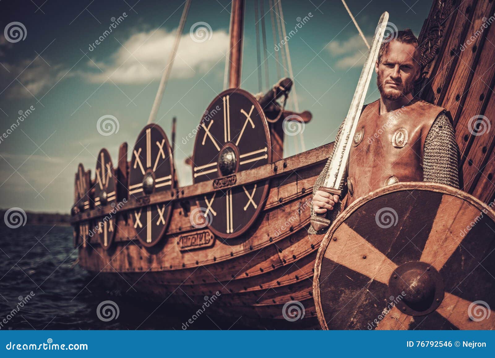 Viking Warrior with Sword and Shield Standing Near Drakkar on the ...