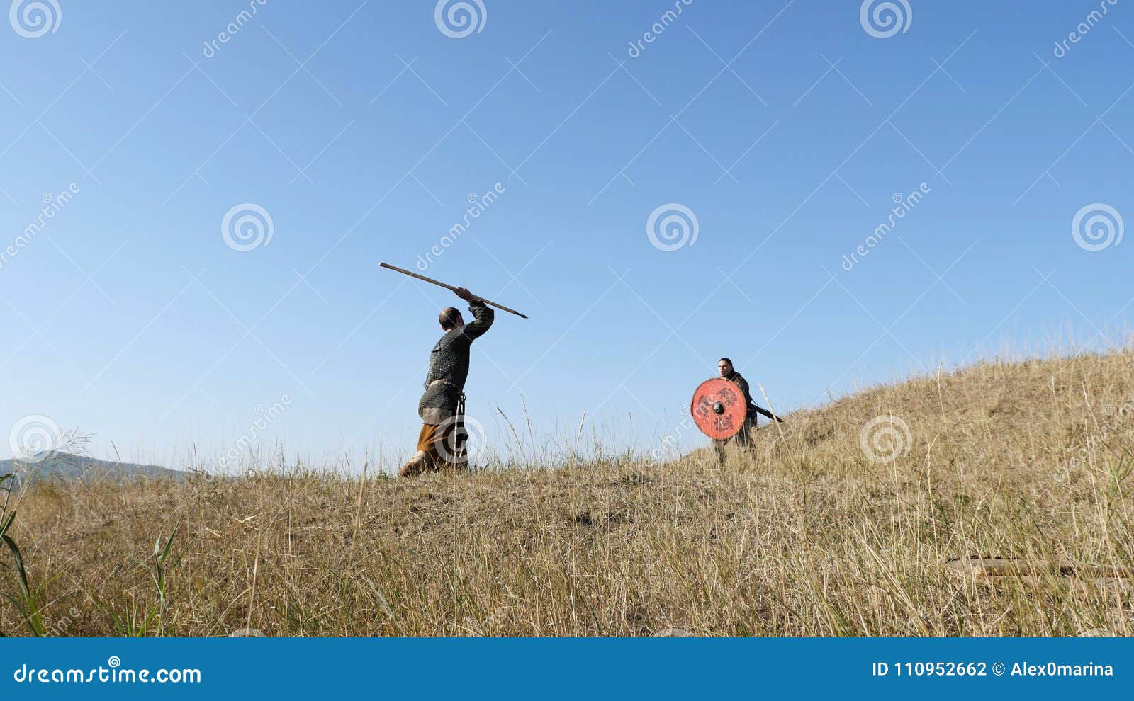 A Viking Warrior Throws a Spear during an Attack. Stock Photo - Image ...