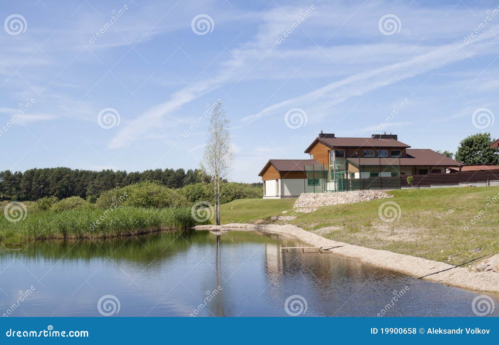 Village on lake bank stock photo. Image of lake, cottage - 19900658