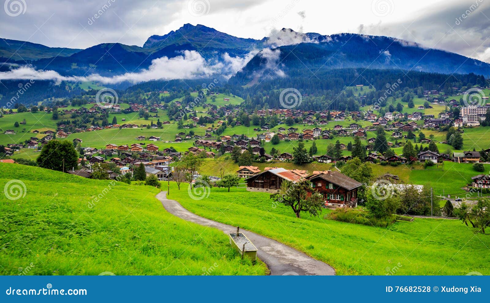 Village under the mountain stock photo. Image of village - 76682528